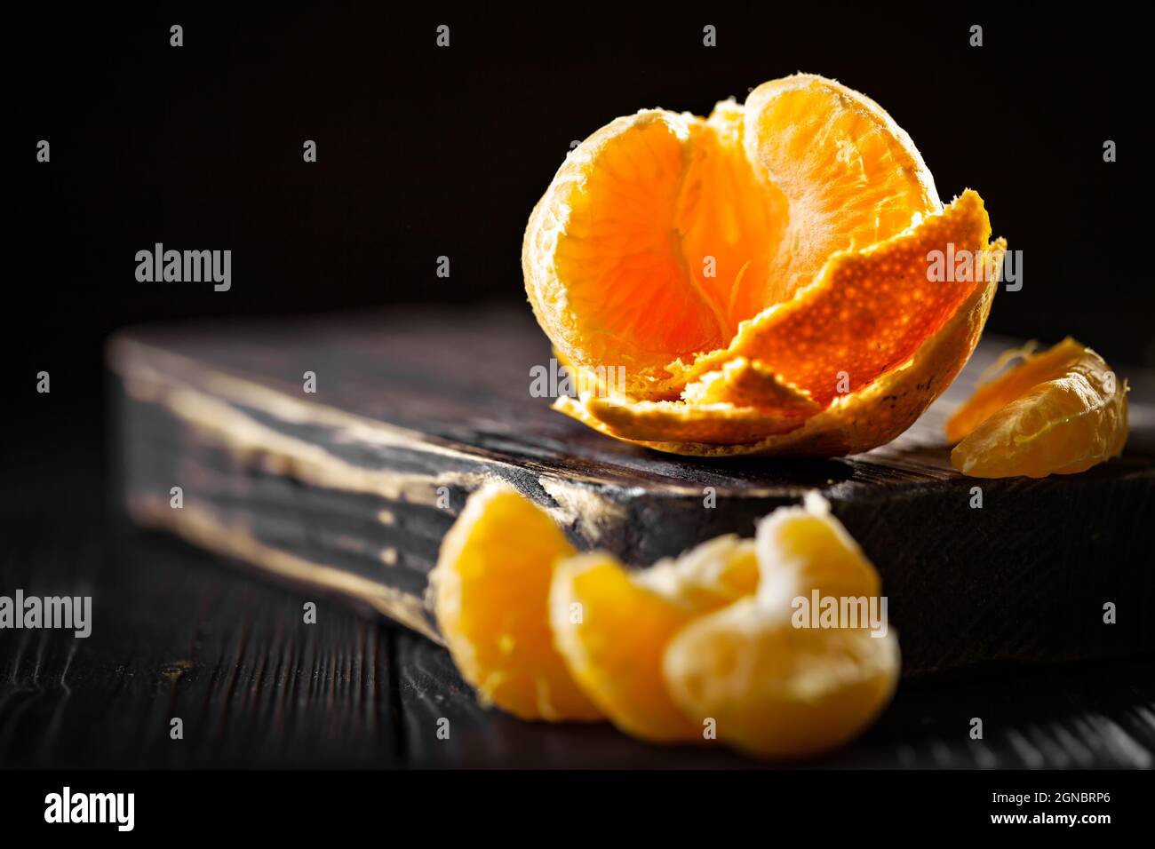 Tangerines on an old fashioned country table. Selective focus ...