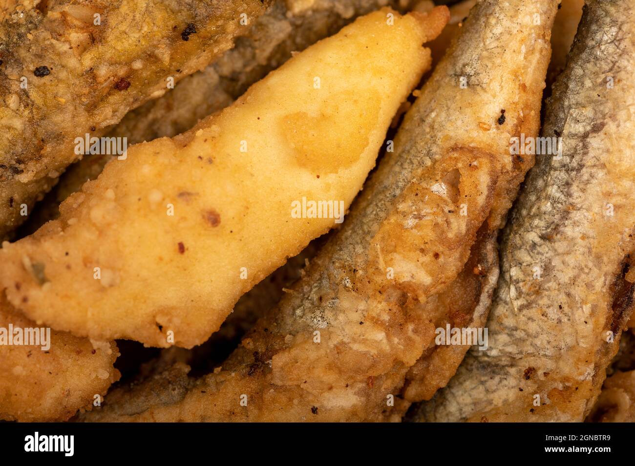 Small fried fish, surface texture, background image, close-up ...
