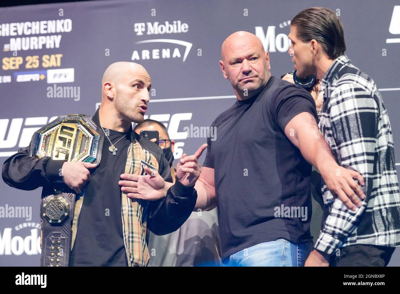 Alexander Volkanovski (left) and Brian Ortega (right) face-off in front ...
