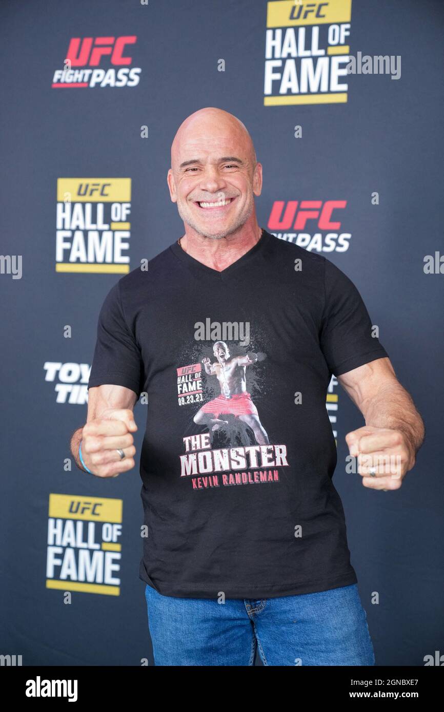Bass Rutten pose on the red carpet for the UFC Hall of Fame celebration ...