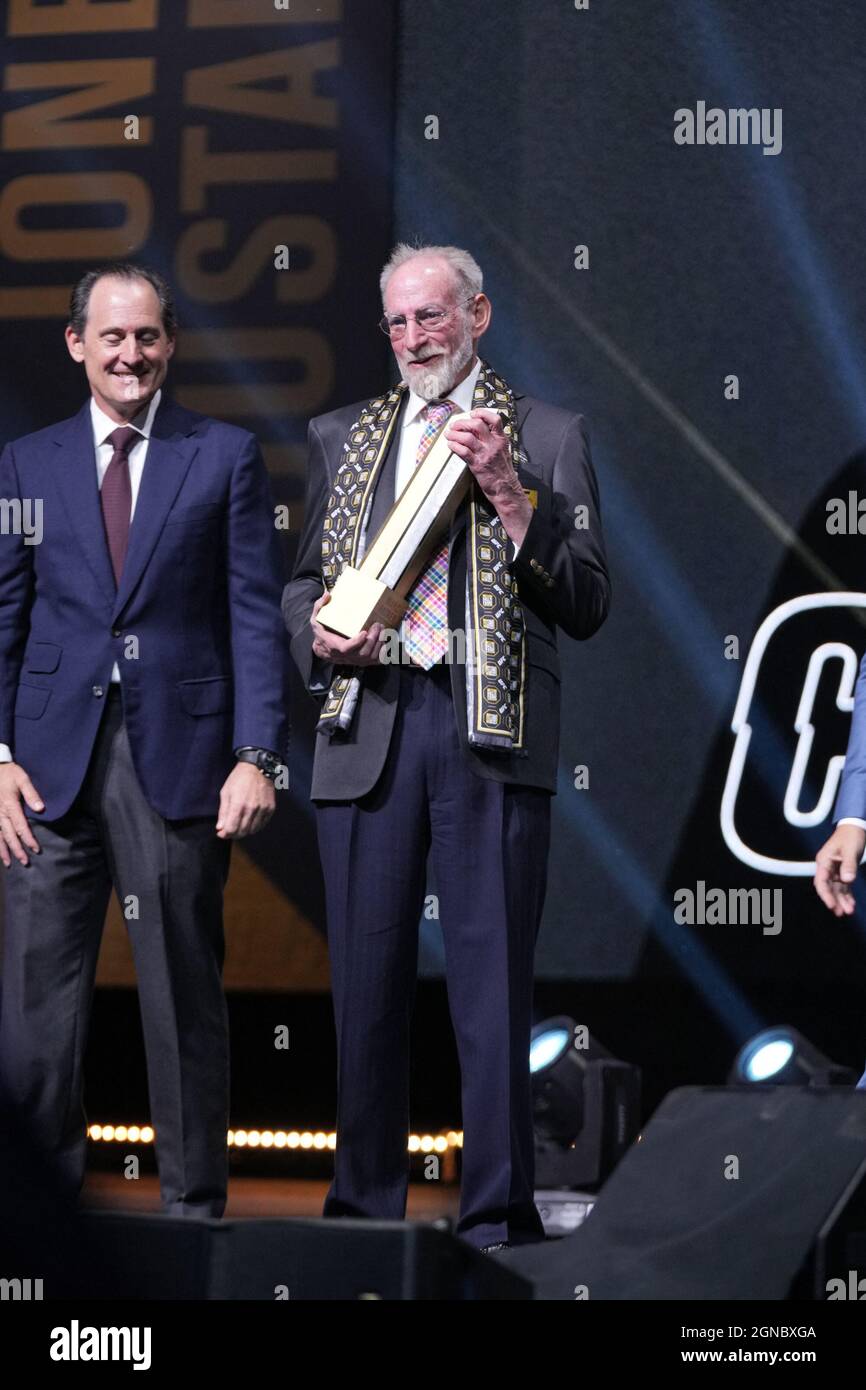 Marc Ratner receives his trophy and his HOF jacket during his induction ...