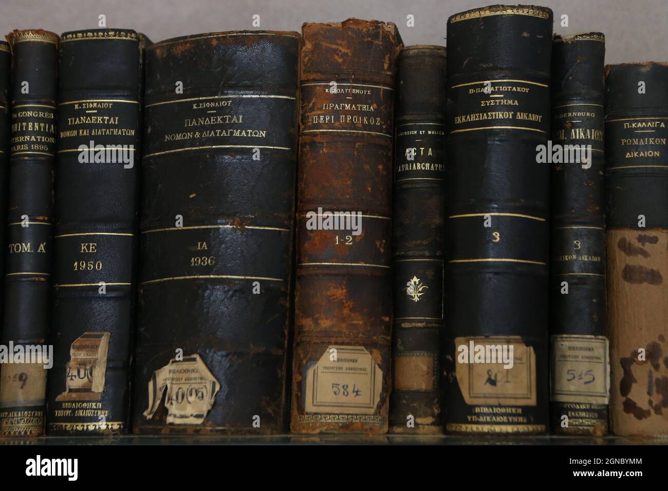 Pile of old Greek books Stock Photo - Alamy