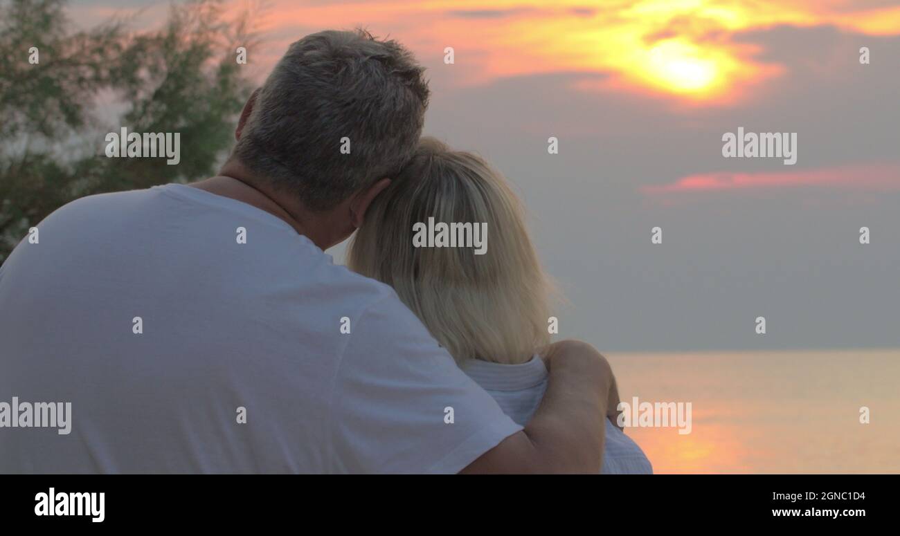 Woman look sea sunset time hi-res stock photography and images - Alamy