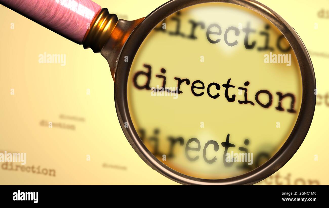 Direction and a magnifying glass on English word Direction to symbolize ...