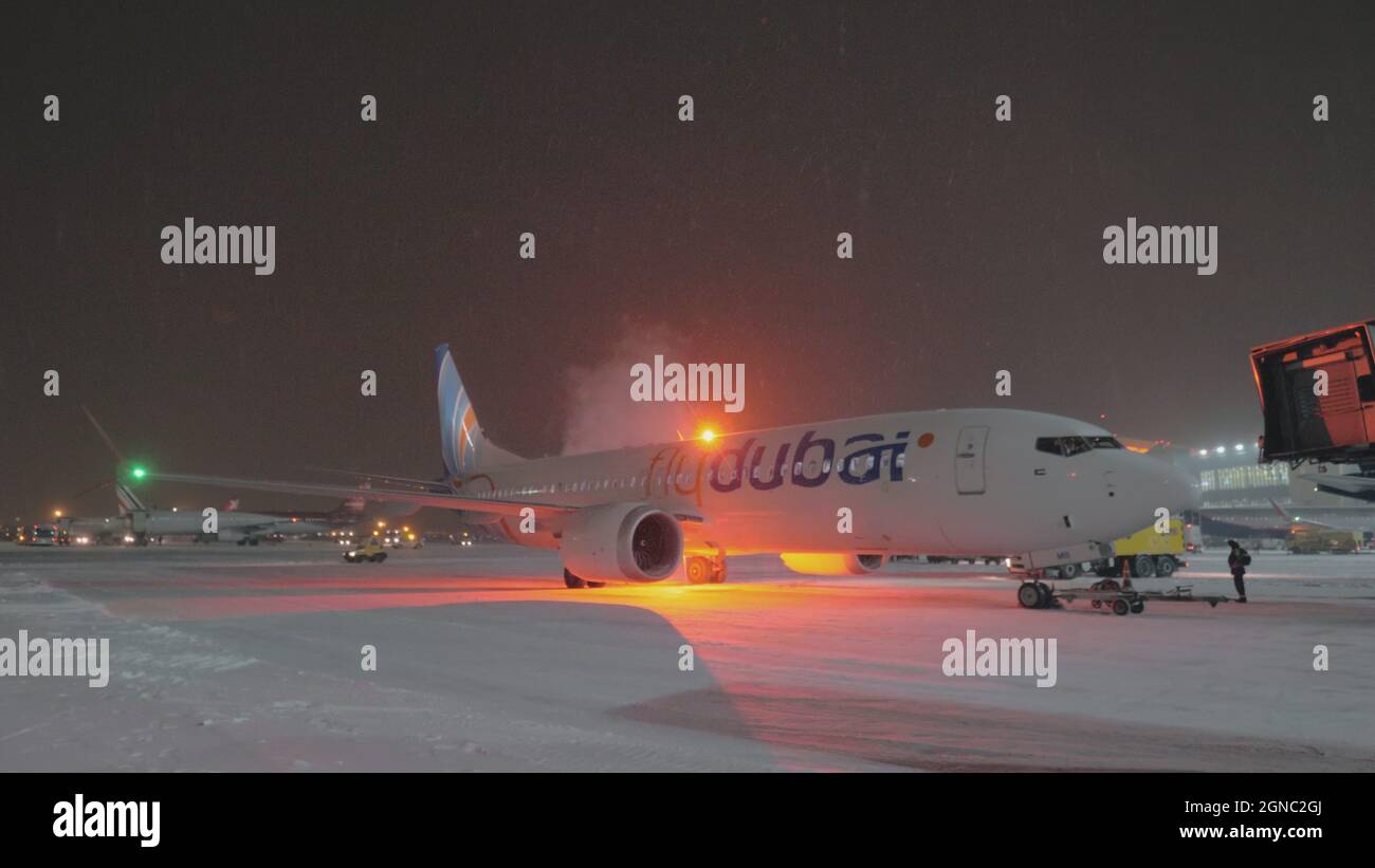 Flydubai Boeing 737 MAX-8 in the airport at winter night Stock Photo ...