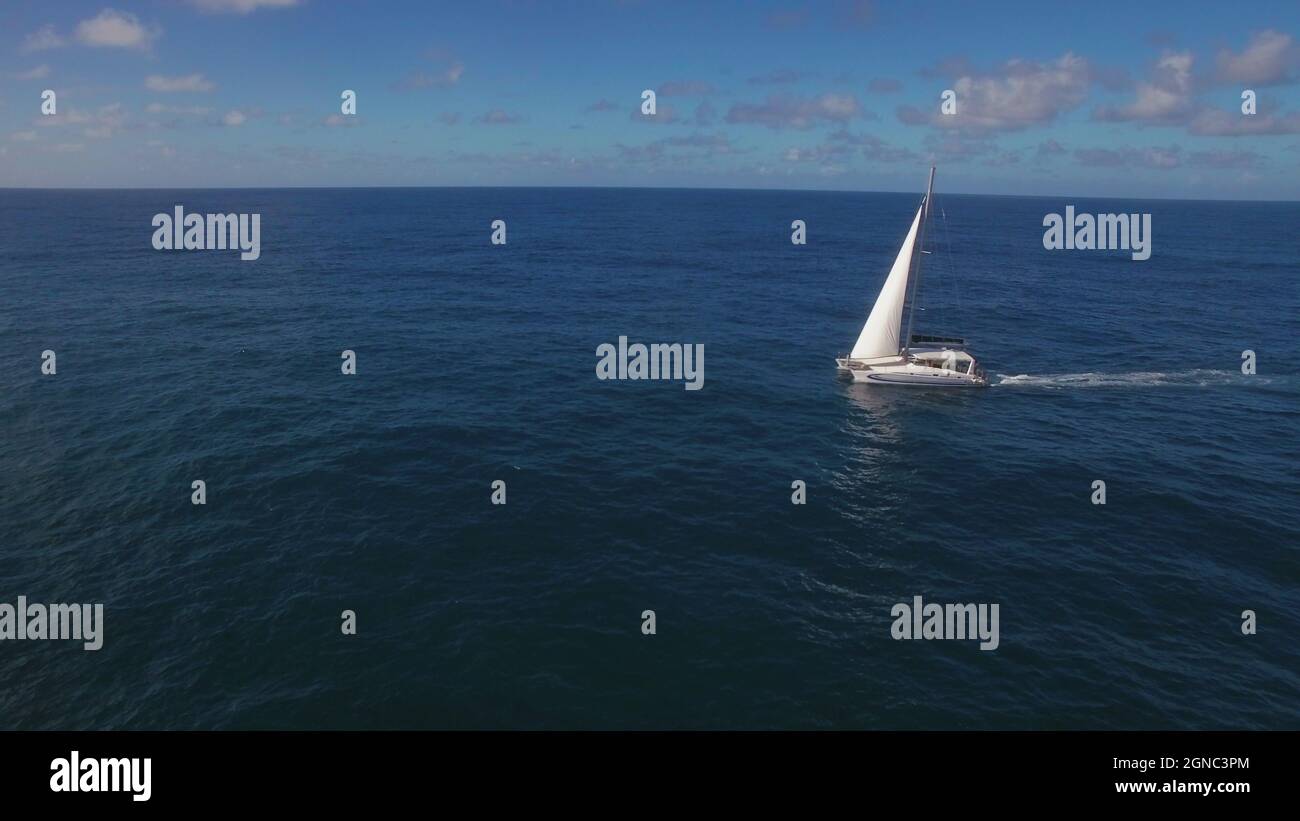 Aerial view of ocean, skyline and sailing yacht Stock Photo - Alamy