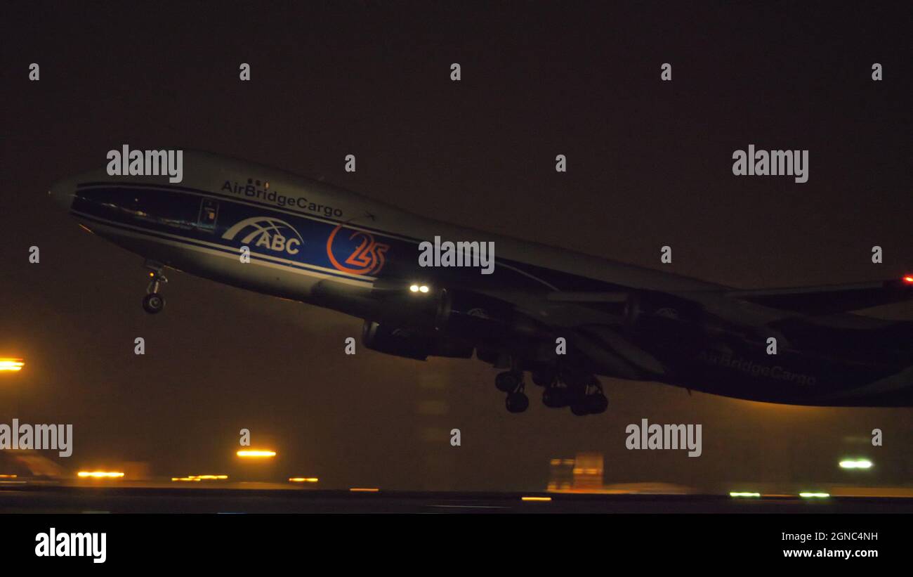 AirBridgeCargo Boeing 747 taking off at night Stock Photo - Alamy