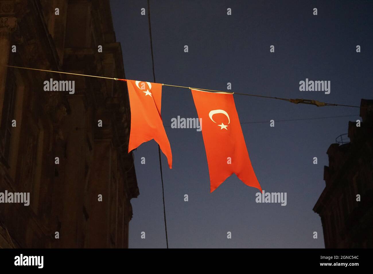 Turkish flags hanging between buildings in Istanbul Stock Photo - Alamy