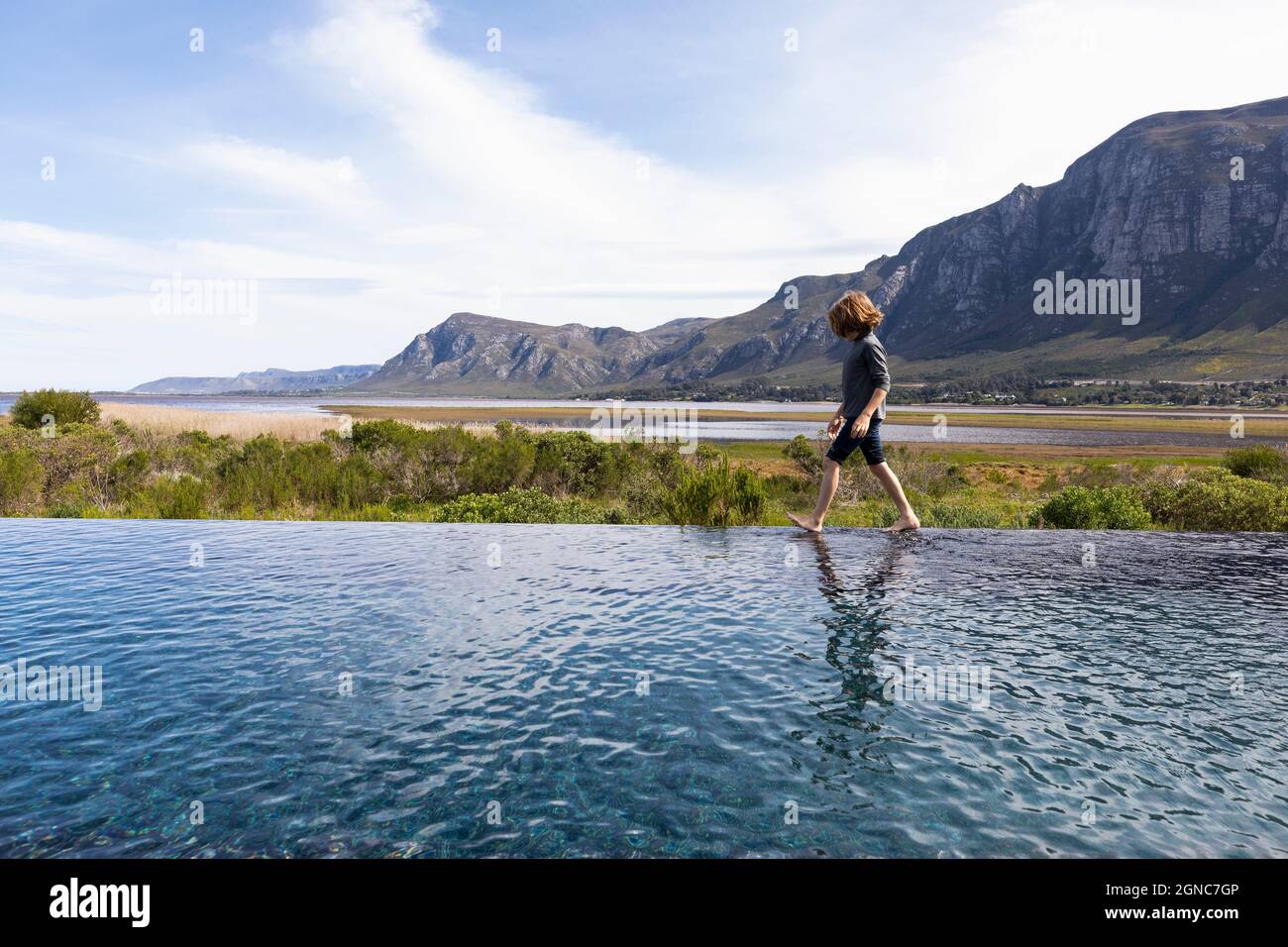 Walking edge of swimming pool hi-res stock photography and images - Alamy