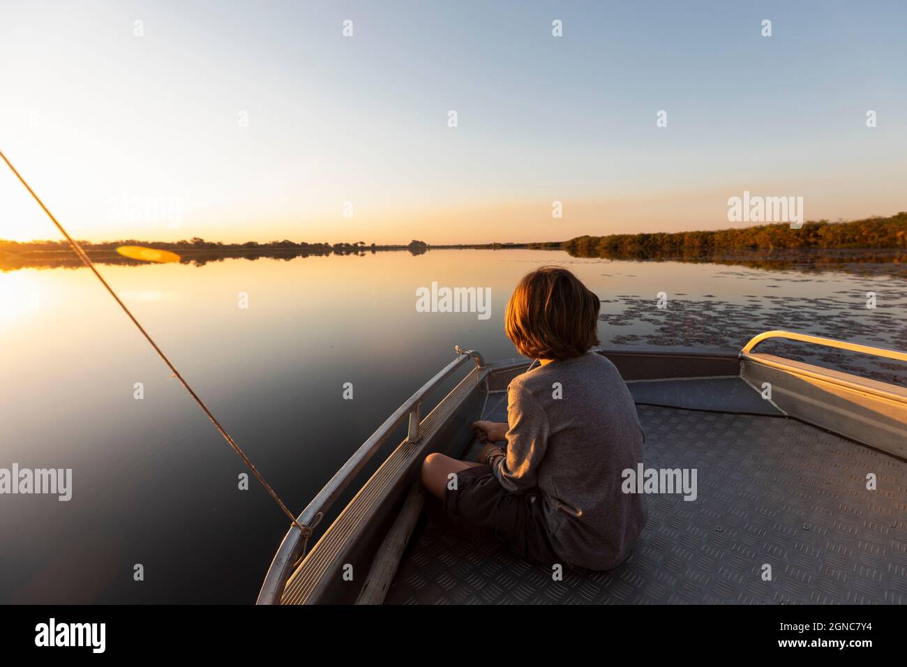 Boy fishing rod boat hi-res stock photography and images - Alamy