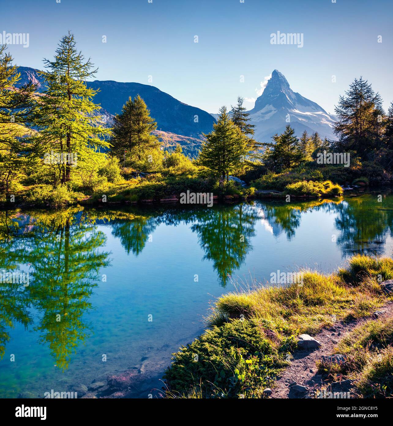Colorful summer evening on the Grindjisee lake. Great view of ...