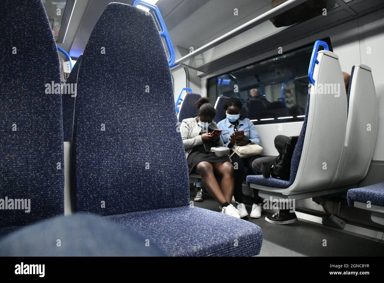 Masked Commuters On London Underground and trains during cover 19 Stock ...