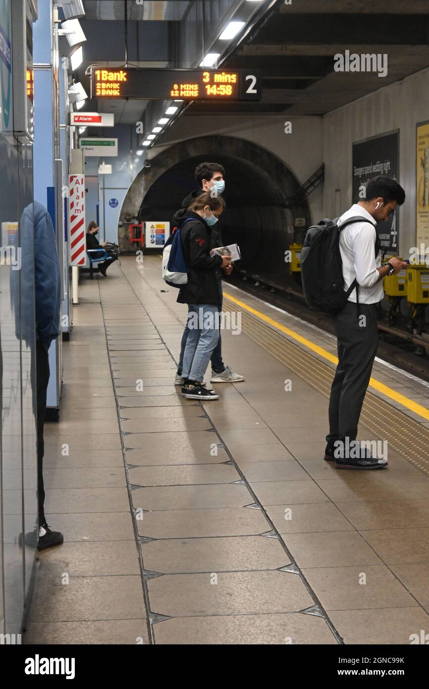 Masked Commuters On London Underground and trains during cover 19 Stock ...