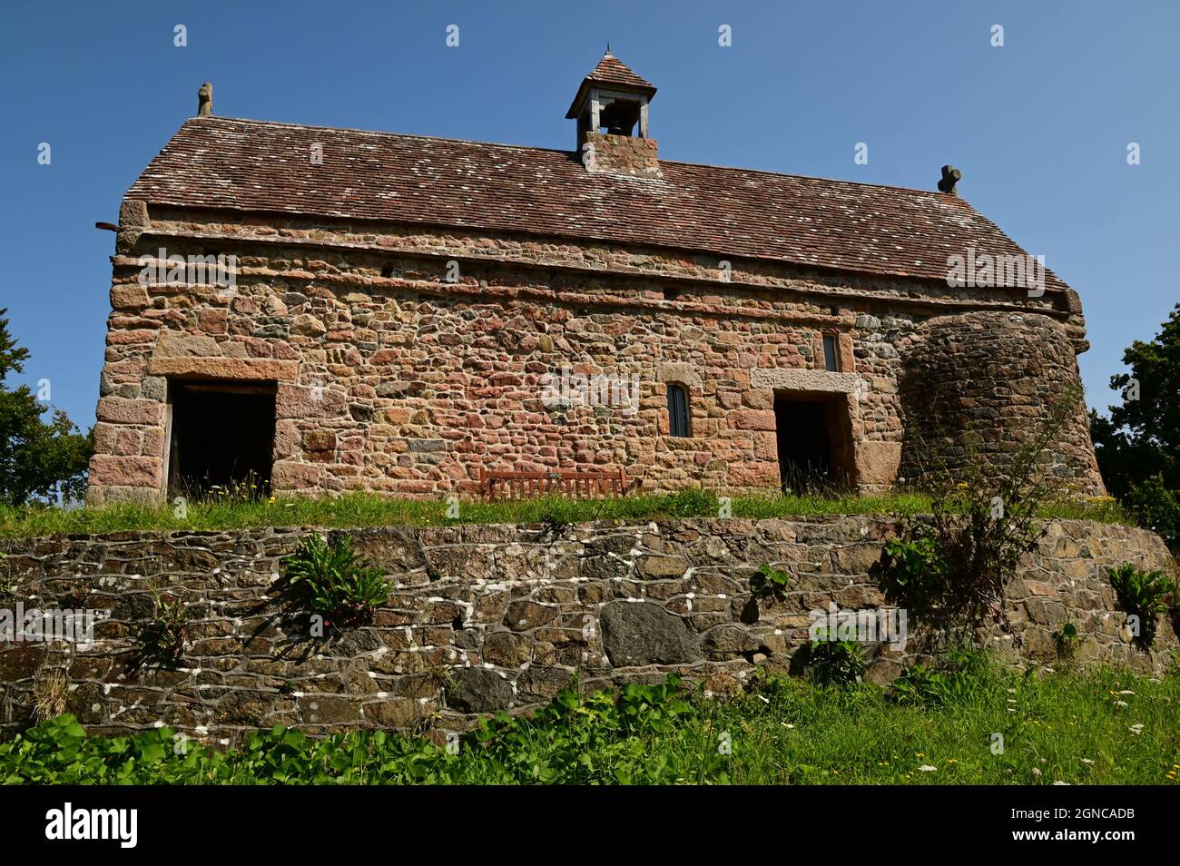An exterior view of the medieval stone church building on top of a ...