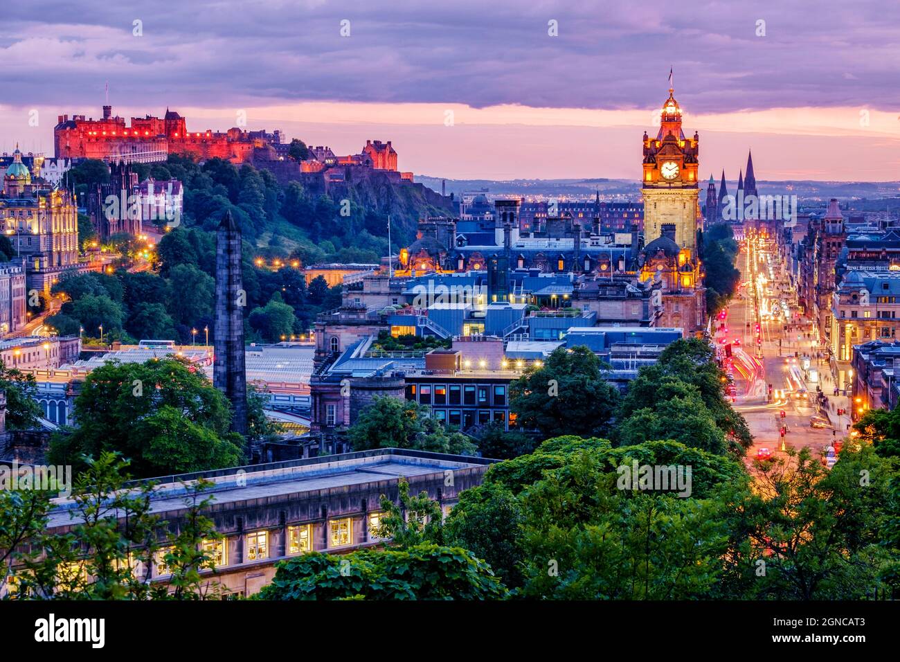 Edinburgh skyline lit up at dawn Stock Photo - Alamy