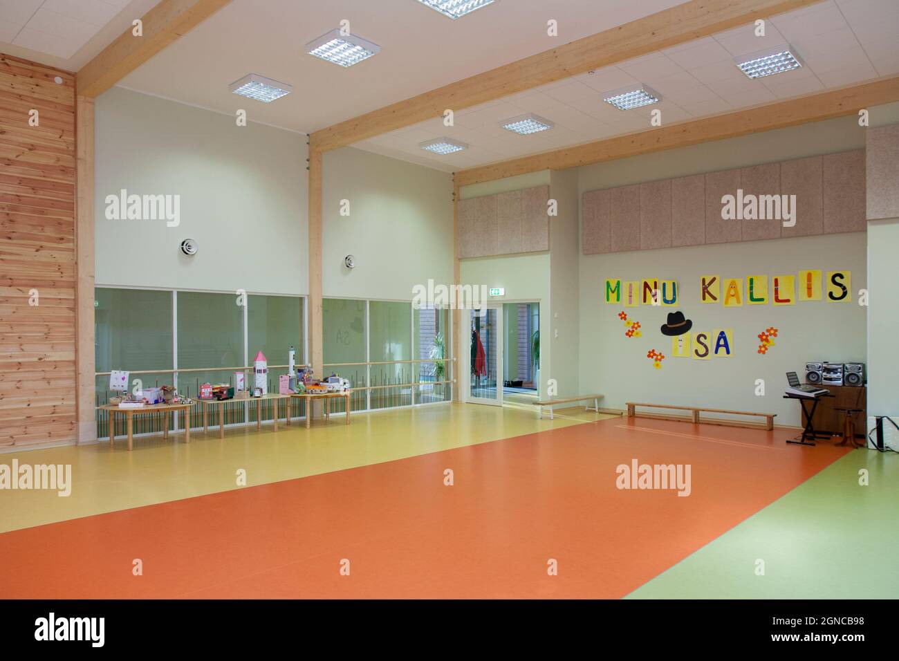 Modern children's day care or pre-school building, open indoors play ...