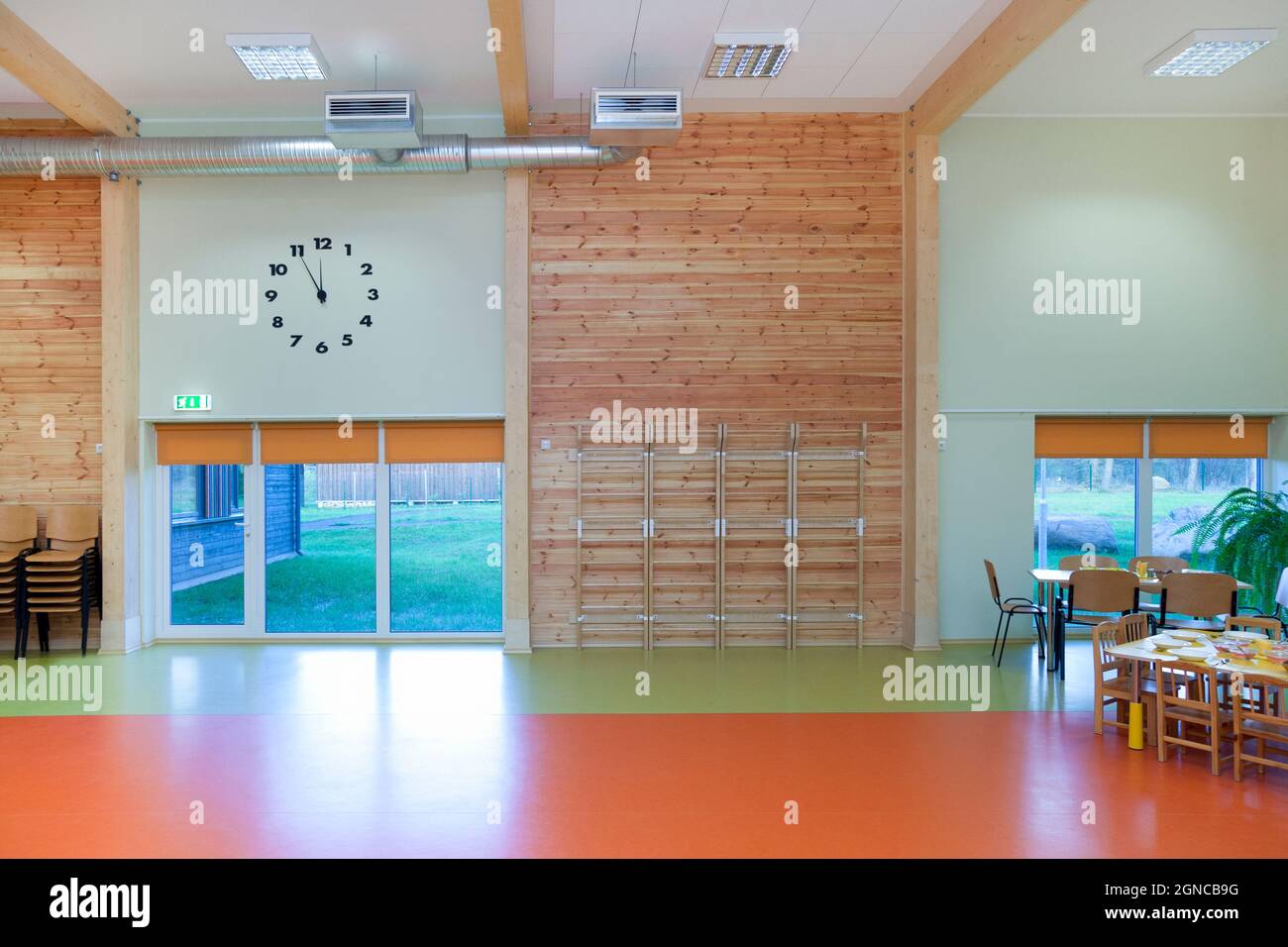 Modern children's day care or pre-school building, open indoors play ...