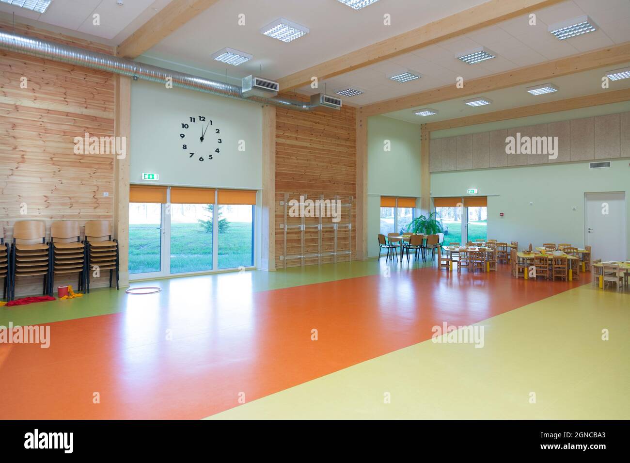 Modern children's day care or pre-school building, open indoors play ...