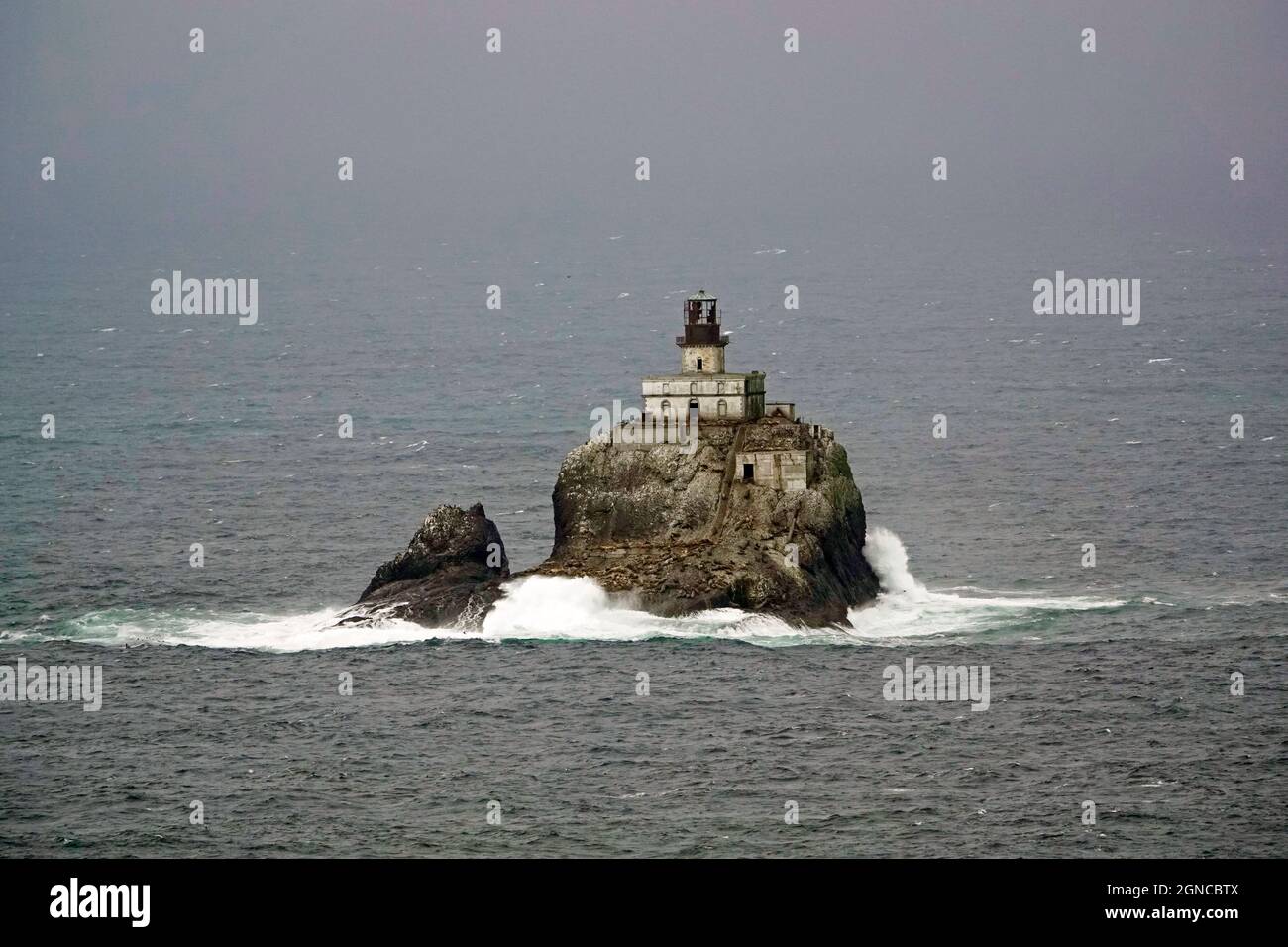A view of Tillamook Head Lighthouse, an island bound lighthouse just ...