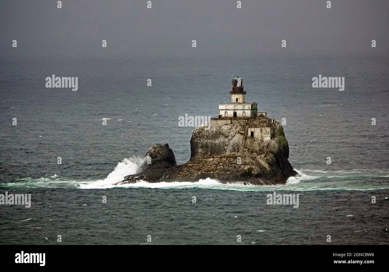 A view of Tillamook Head Lighthouse, an island bound lighthouse just ...