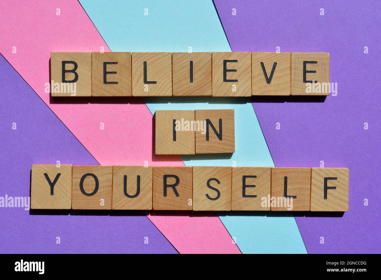 Believe In Yourself, words in wooden alphabet letters isolated on ...