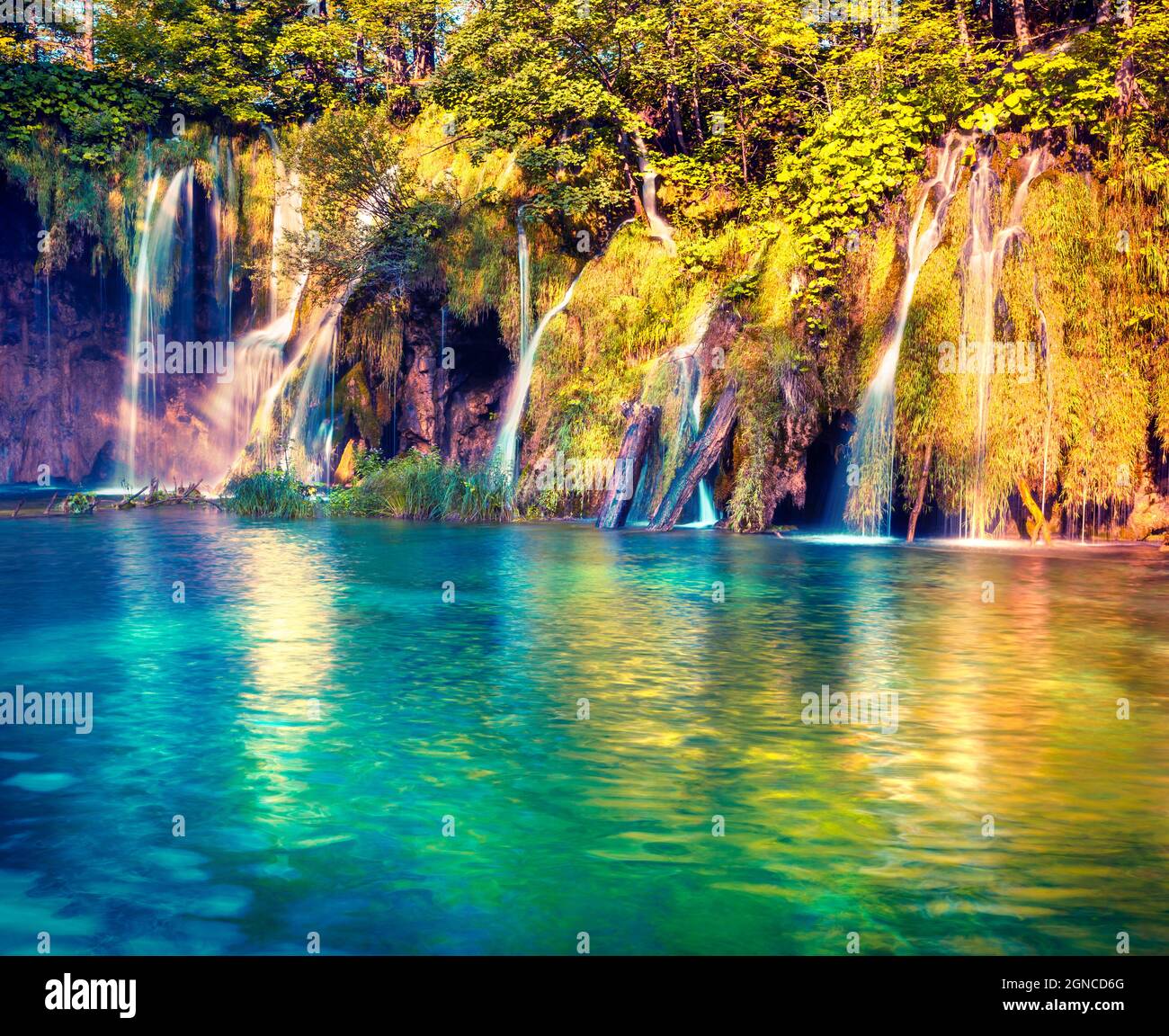 Sunny summer scene in Plitvice Lakes National Park. Pure water ...