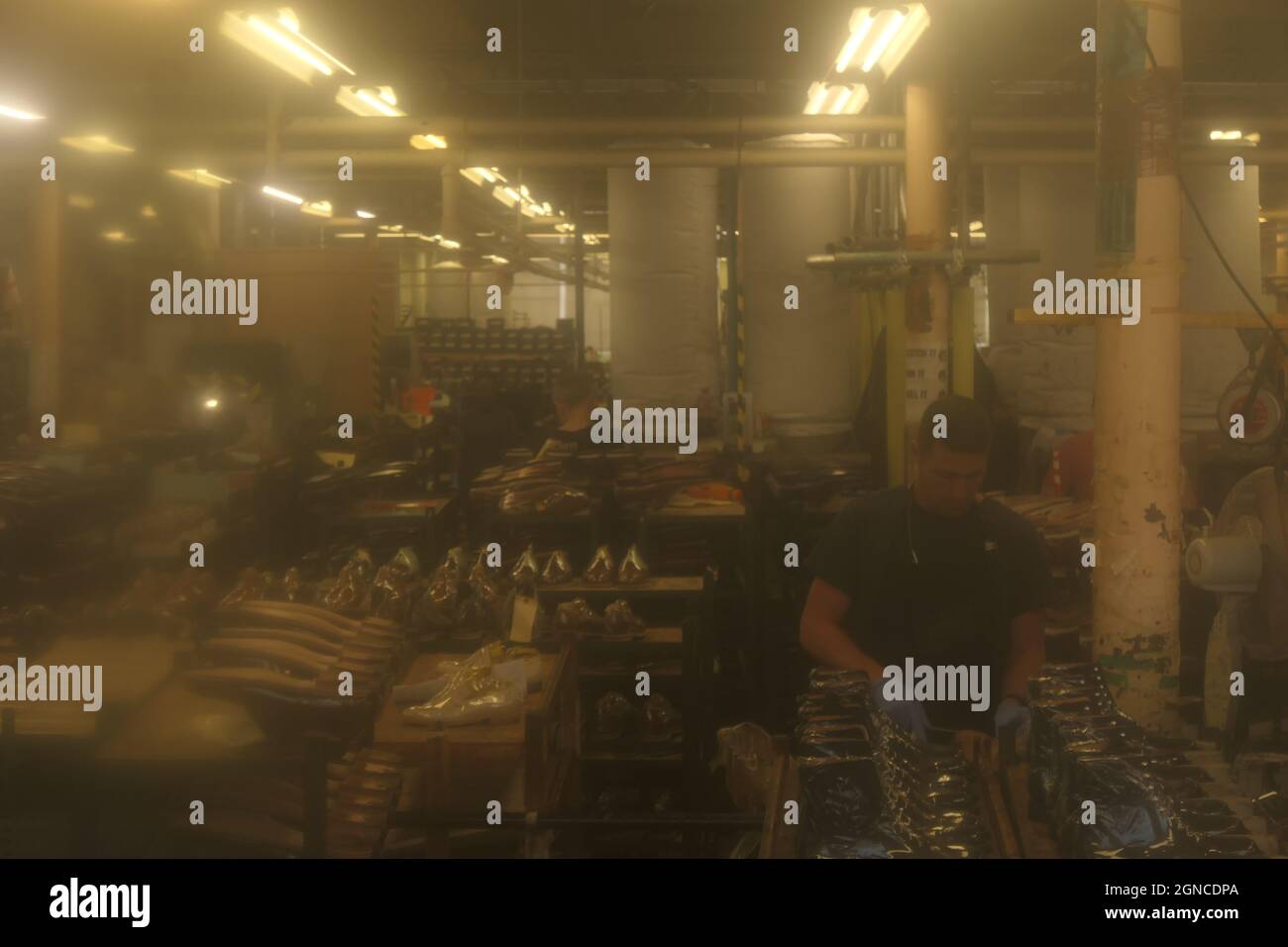 View into the work place making shoes at Crocket and jones shoe factory ...