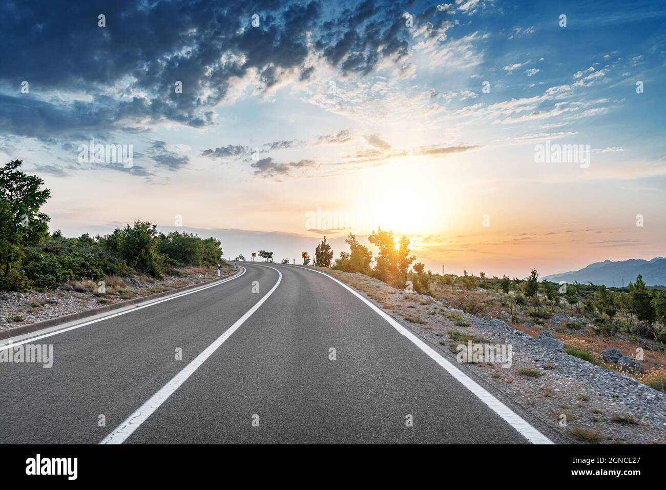 Scenic road. Road is surrounded by a magnificent natural landscape ...