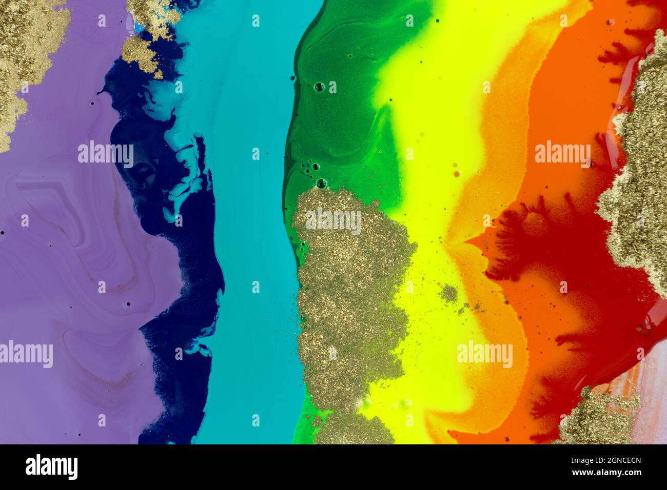 Rainbow liquid acrylic ink texture with gold dust Stock Photo - Alamy