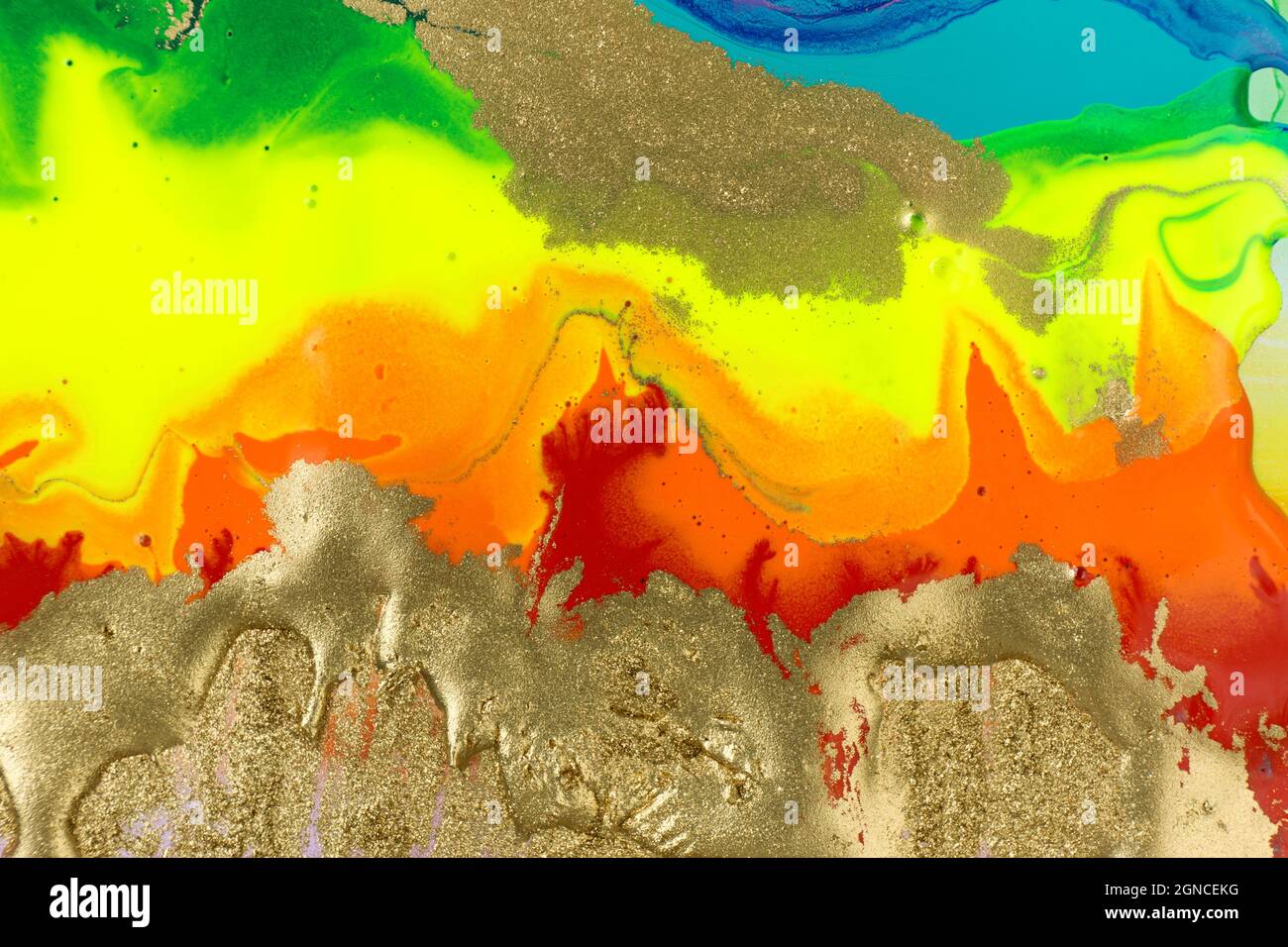Rainbow liquid acrylic mixed ink texture with gold dust Stock Photo - Alamy