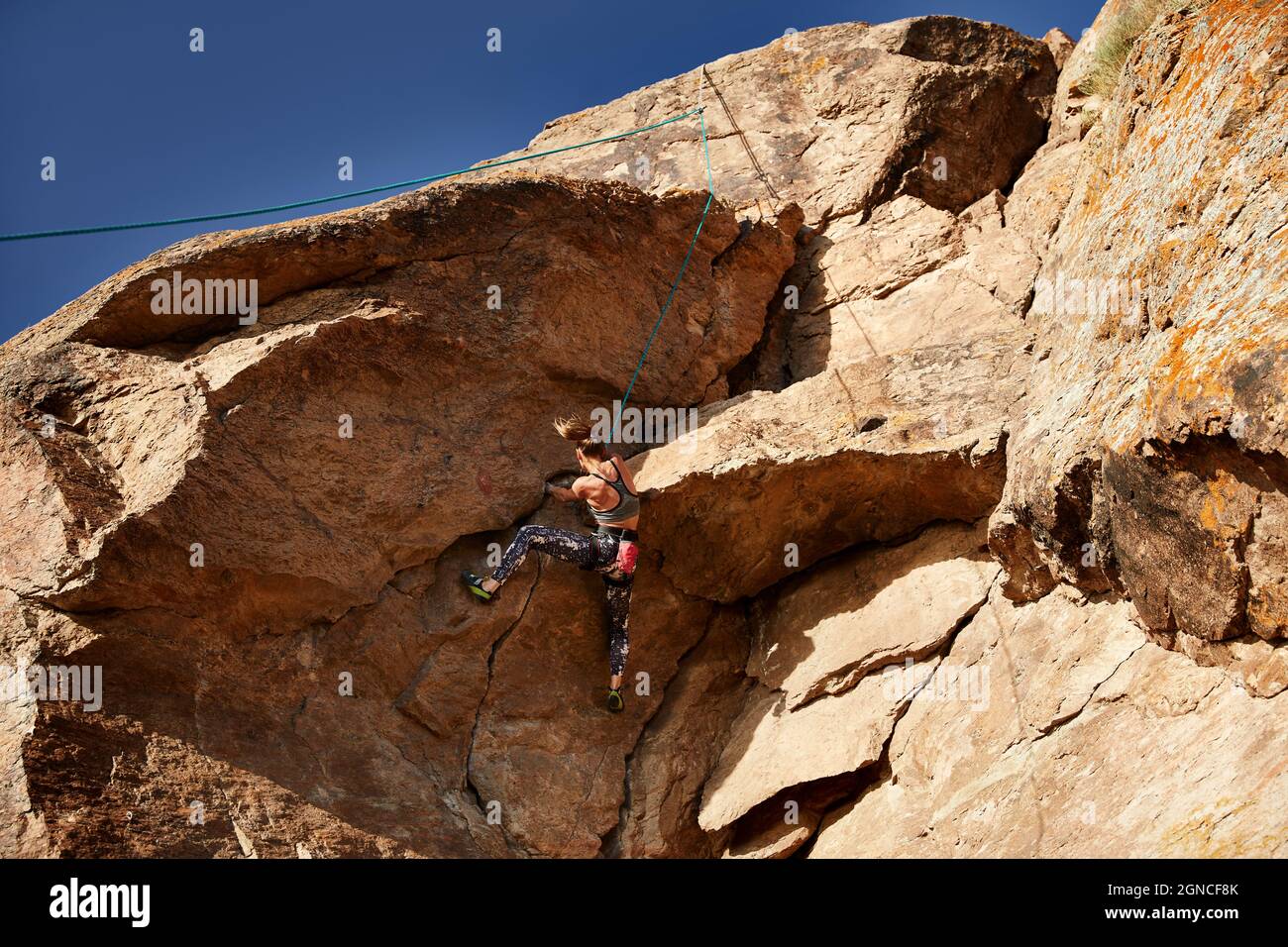 Woman young fit wall extreme sport hi-res stock photography and images ...
