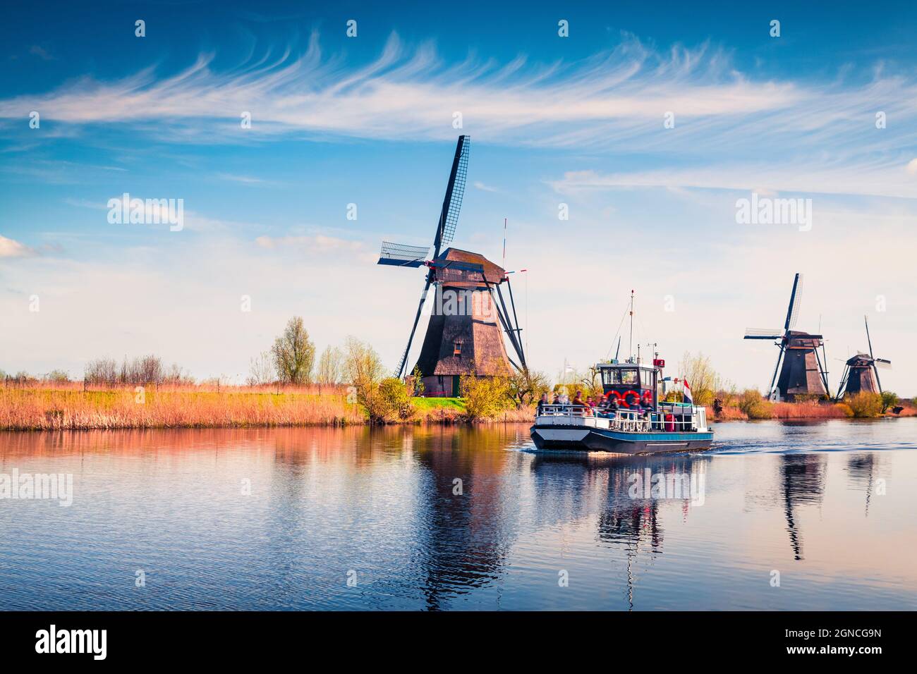 Famous windmills in Kinderdijk museum in Holland. Sunny spring morning ...