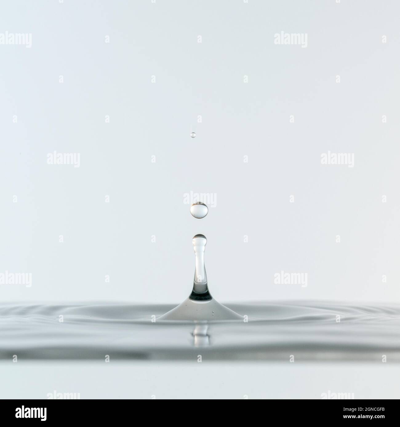 front view clear liquid drops. High quality and resolution beautiful ...