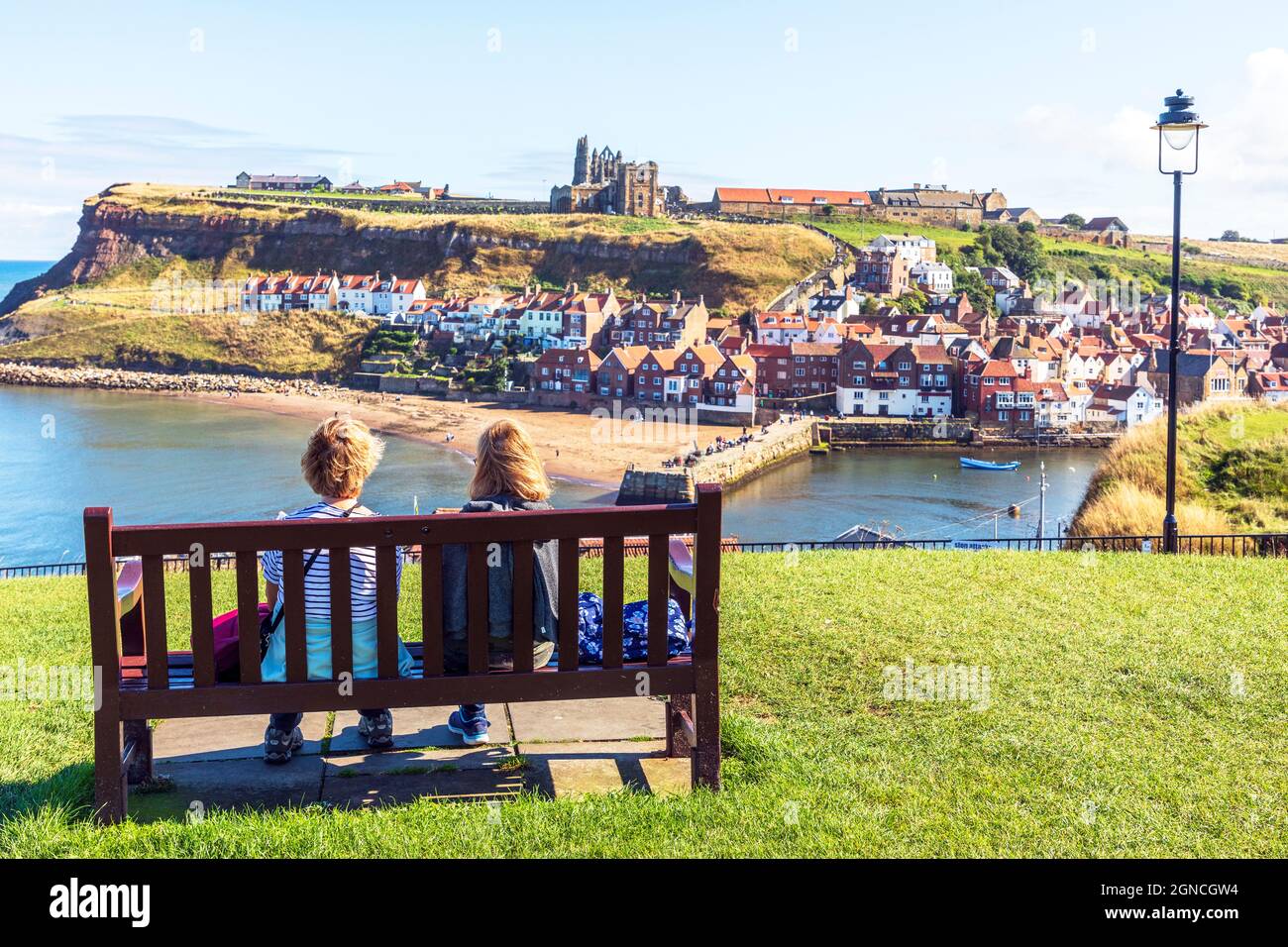 View south over Whitby harbour and the river Esk towards Whitby abbey ...
