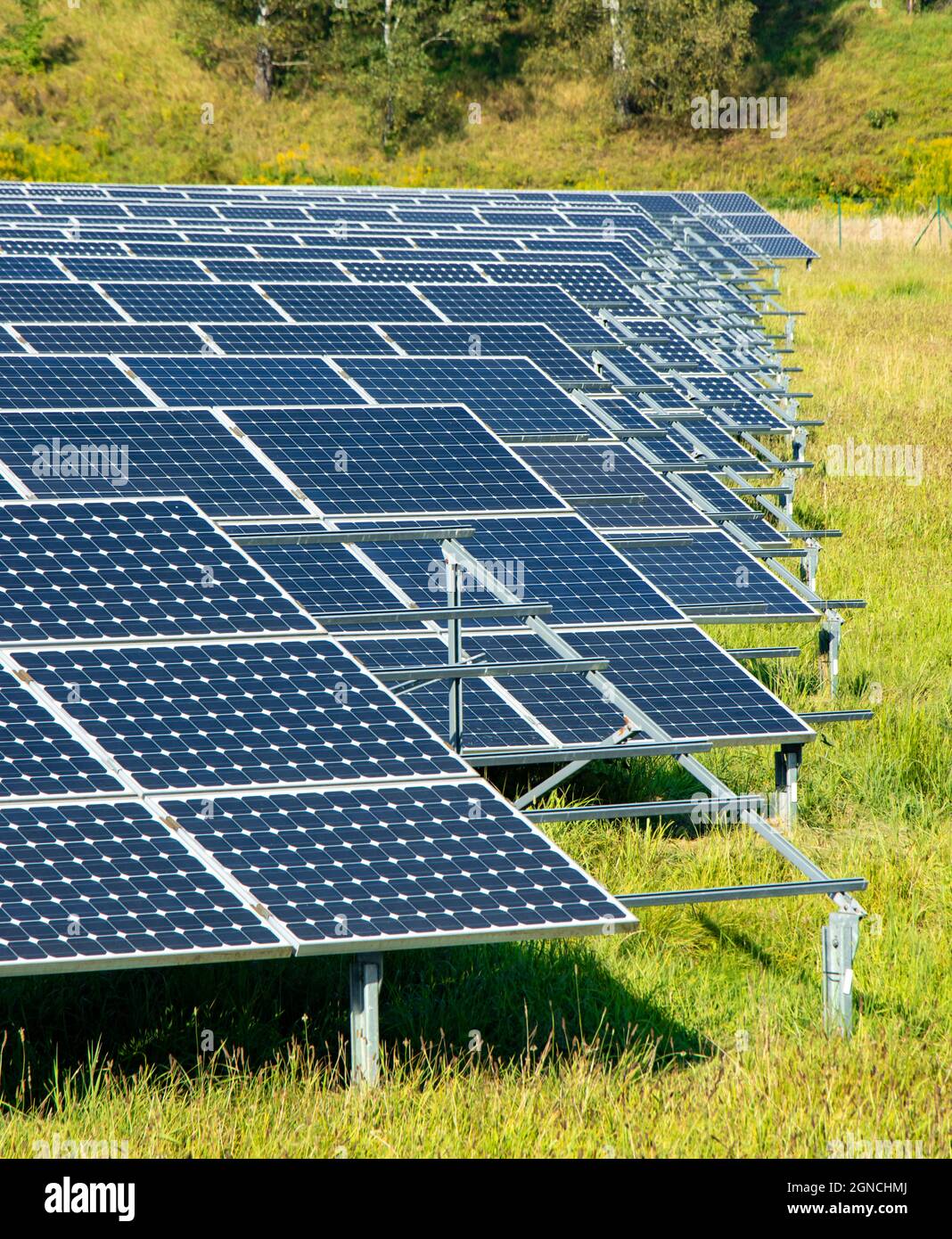Rows of solar panels in a solar power plant Stock Photo - Alamy