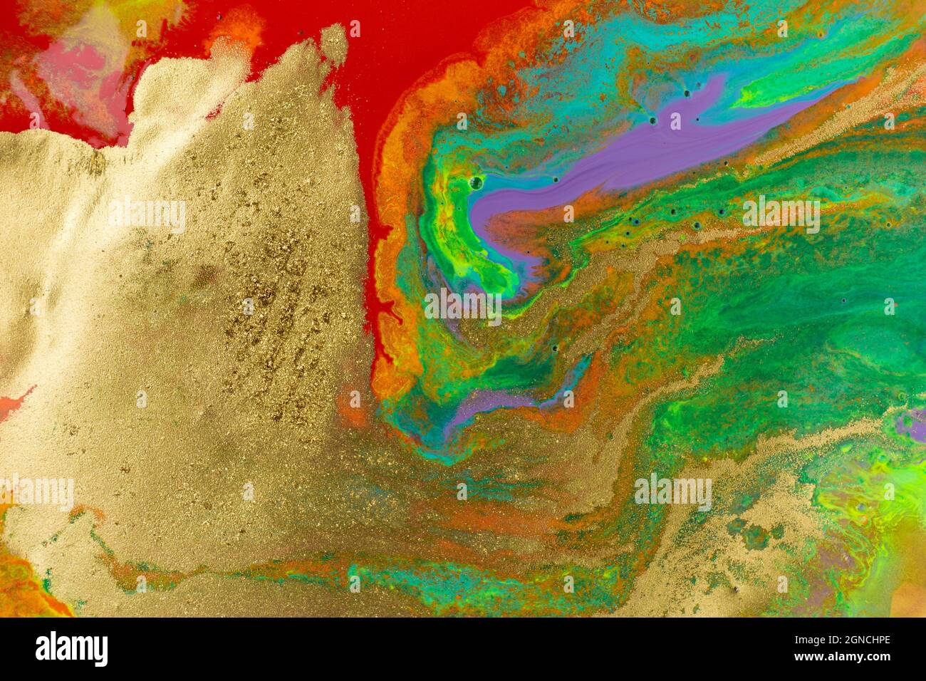 Gold spots on rainbow smudges of paint. Abstract pattern Stock Photo ...