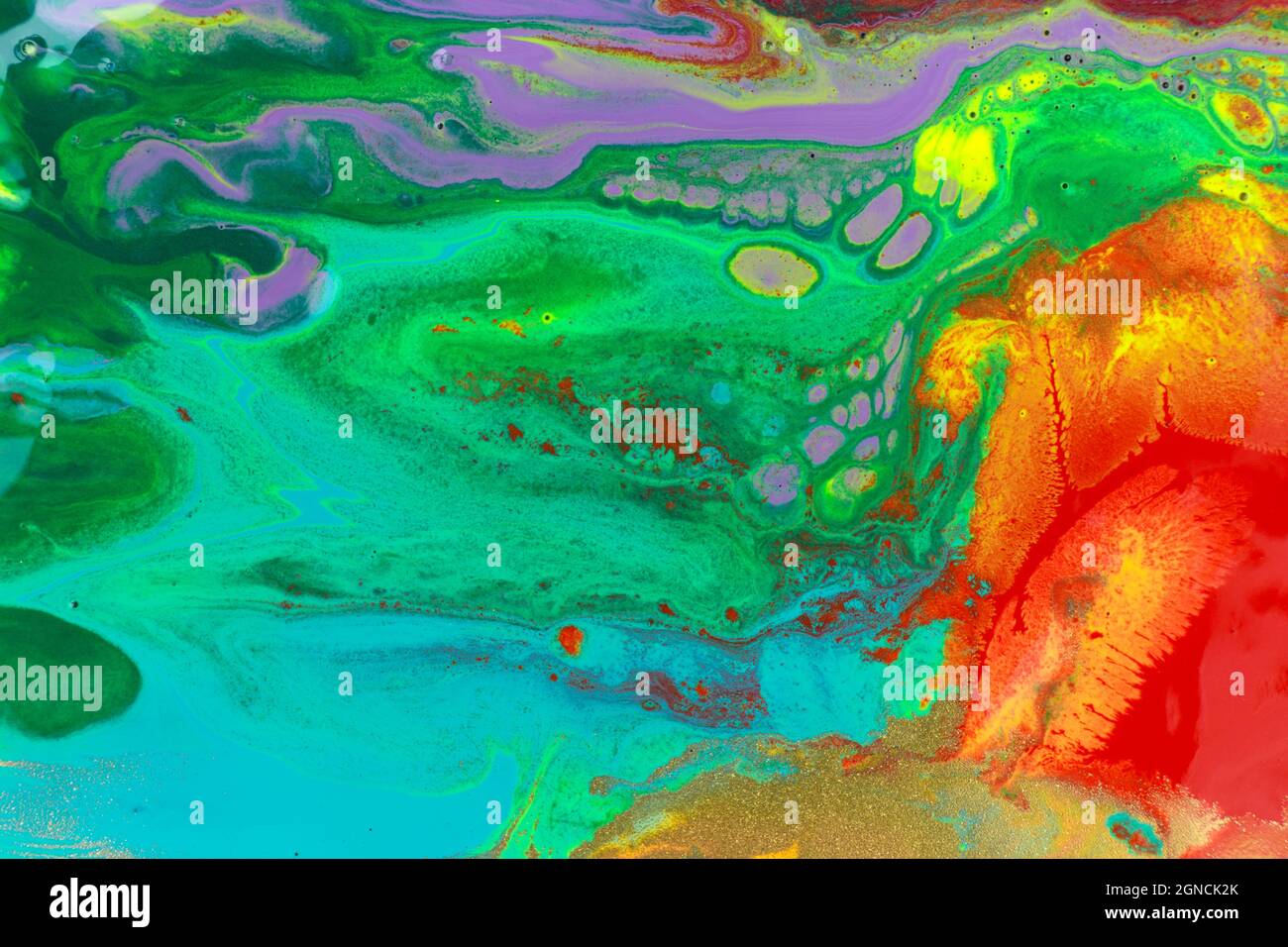 Gold spots on rainbow smudges of paint. Abstract pattern Stock Photo ...