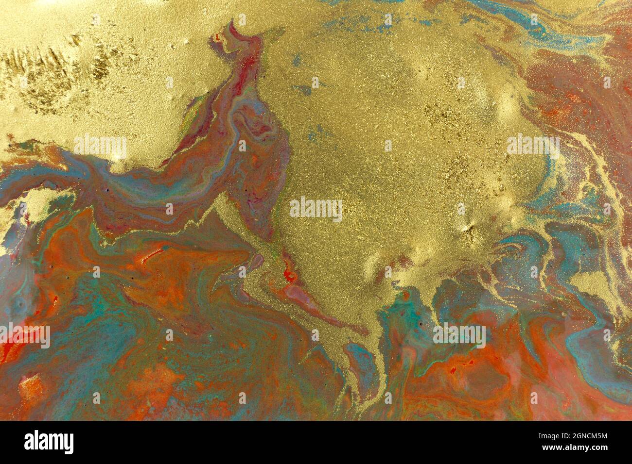 Gold spots on red smudges of paint. Abstract pattern Stock Photo - Alamy