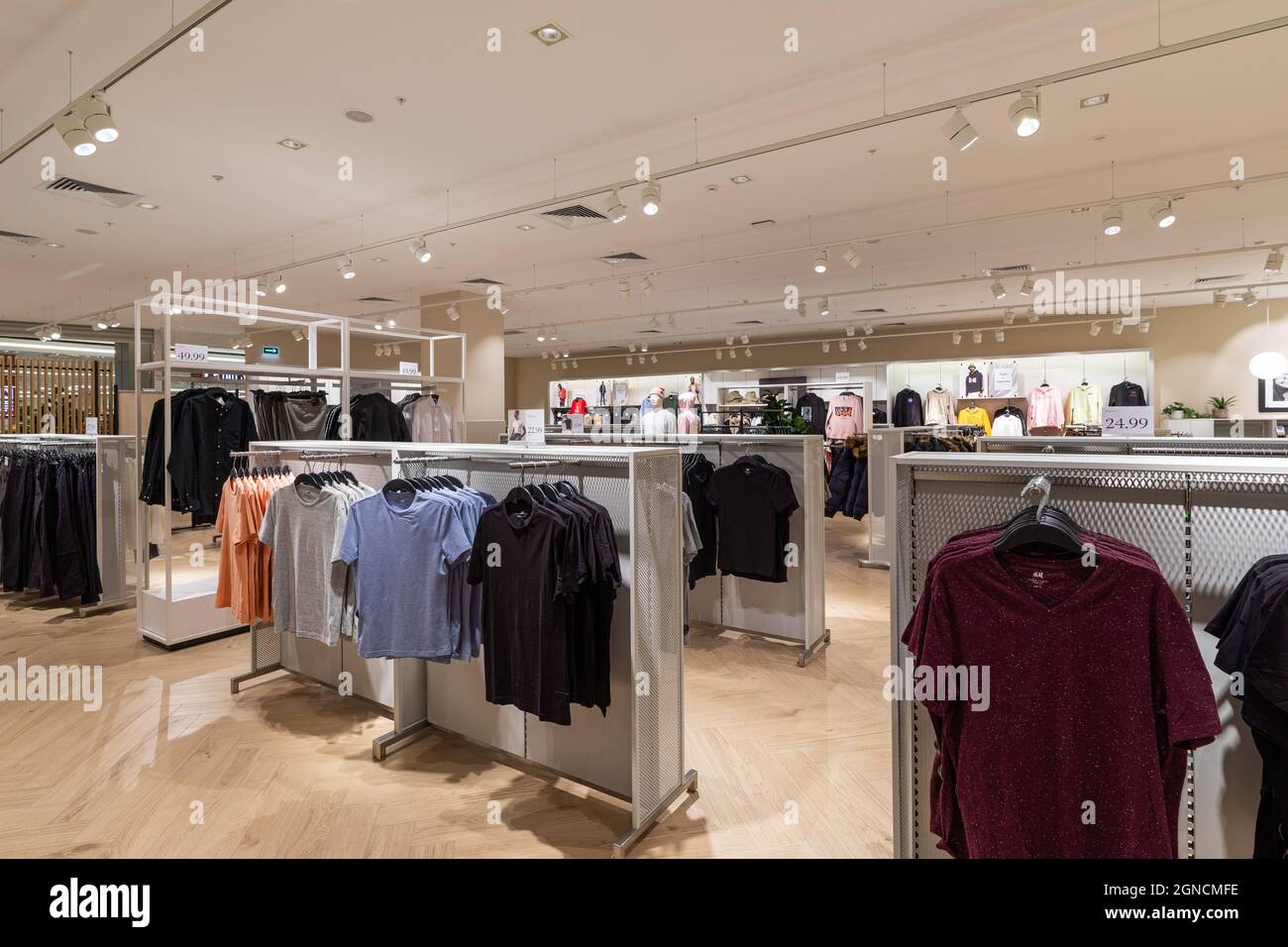 Modern fashionable brand interior of clothing store inside shopping ...