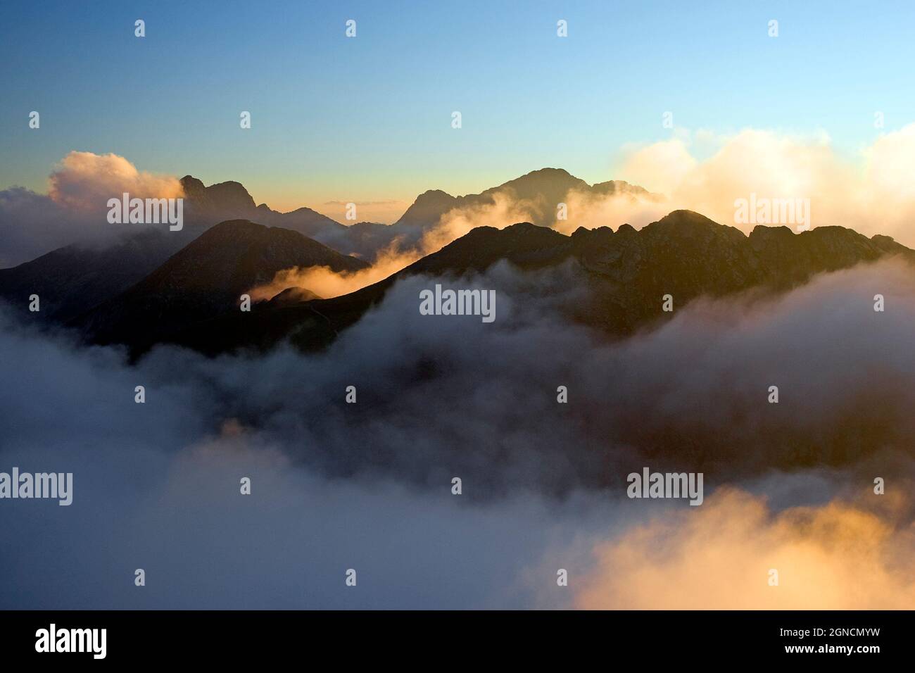 Mountains landscape between clouds hi-res stock photography and images ...
