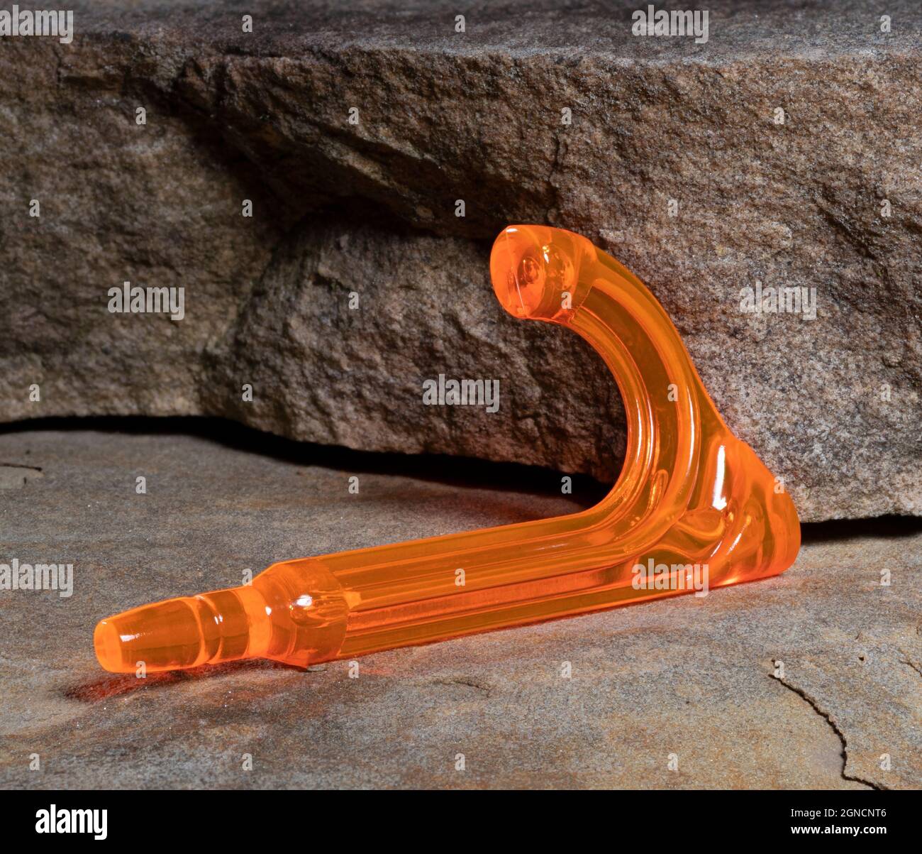 Bright orange gear that goes into a gun's empty chamber to show it's ...