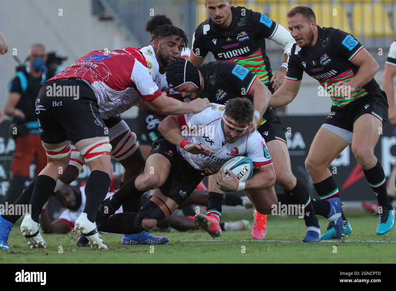 Parma, Italy. 24th Sep, 2021. Carlu Sadie (Lions) is tackled by Luca ...