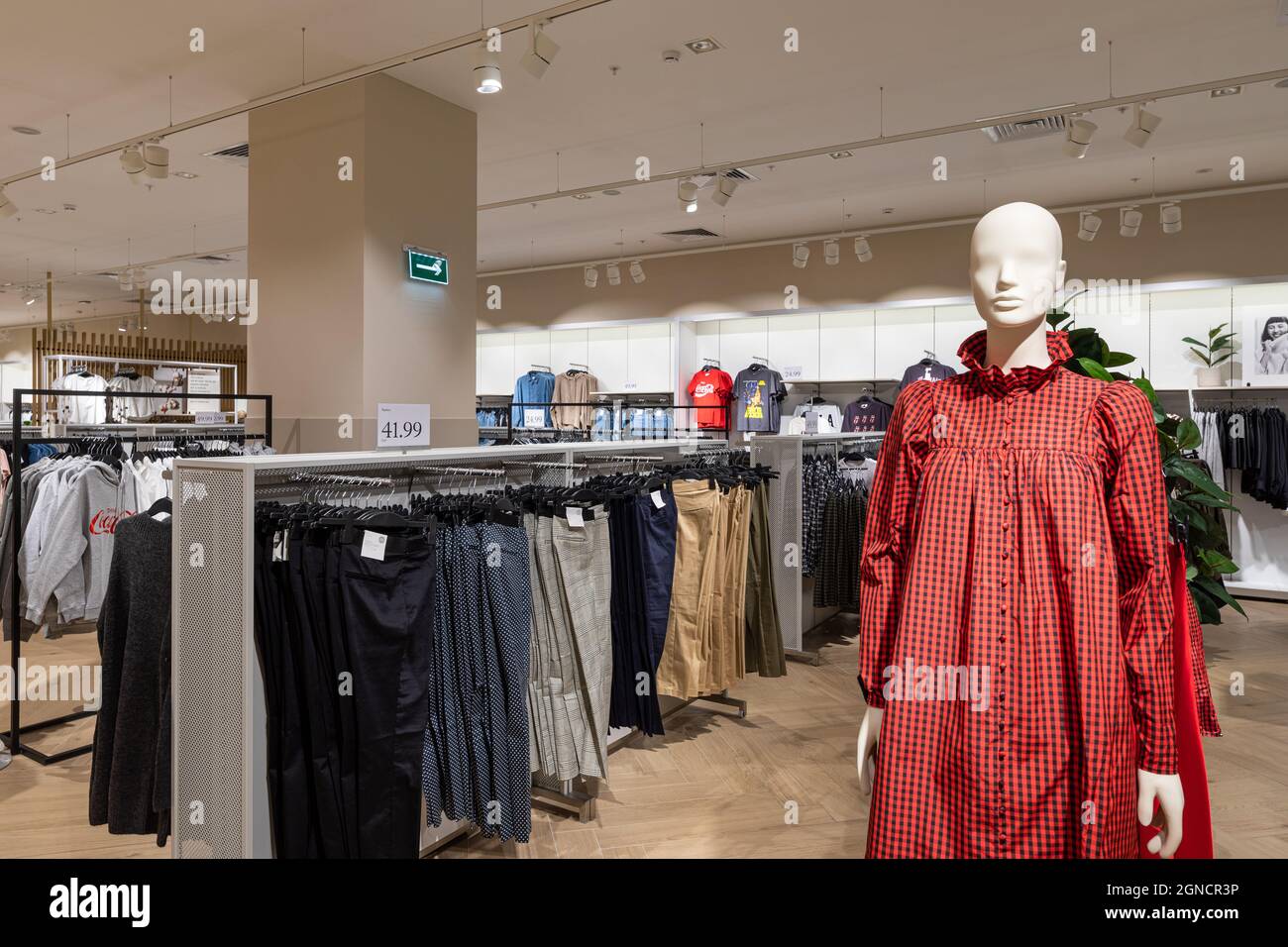 Modern fashionable brand interior of men and women clothing shop store ...