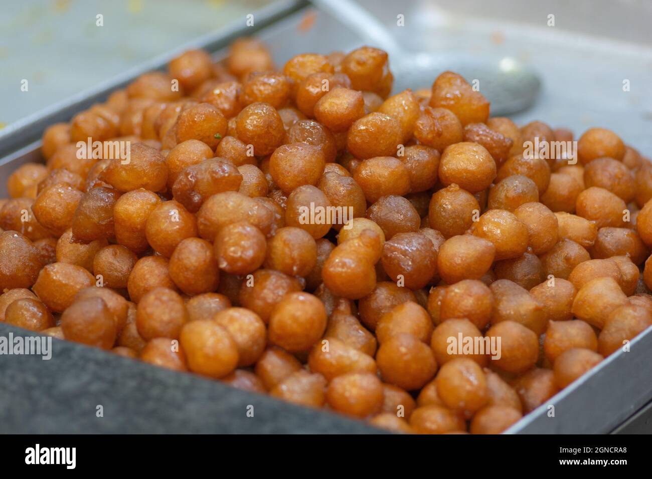 Pile of Awamat sweets, also known as Lokmet El Kady, and Lokaymat ...