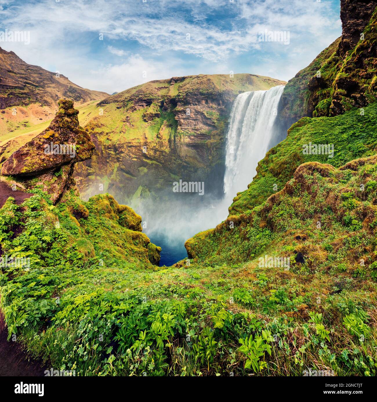 Picturesque morning view of Skogafoss Waterfall on Skoga river. Bright ...