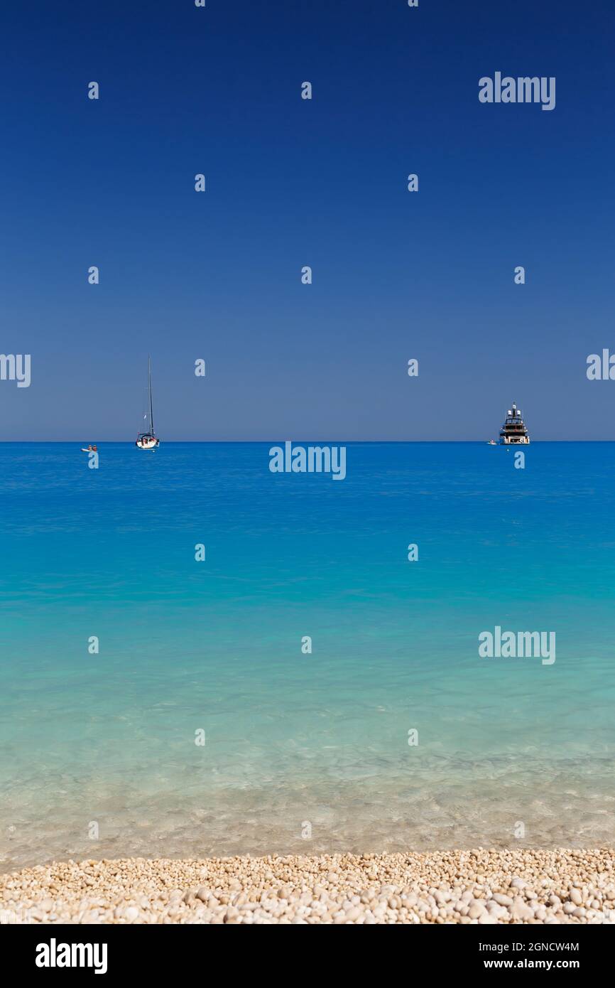 Close up view at Myrtos Beach with turquoise and blue water. Greek ...