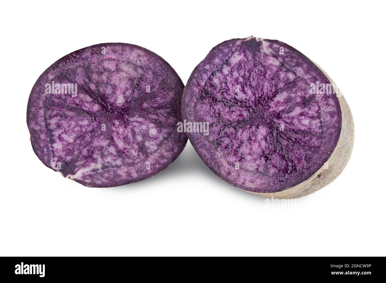 Fresh purple potatoes isolated on a white background. File contains ...