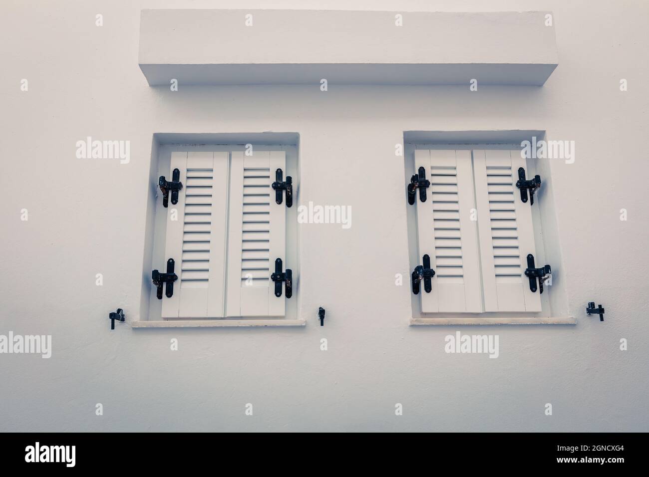 Shutters on the window in the famous resort Fira, Santorini island ...