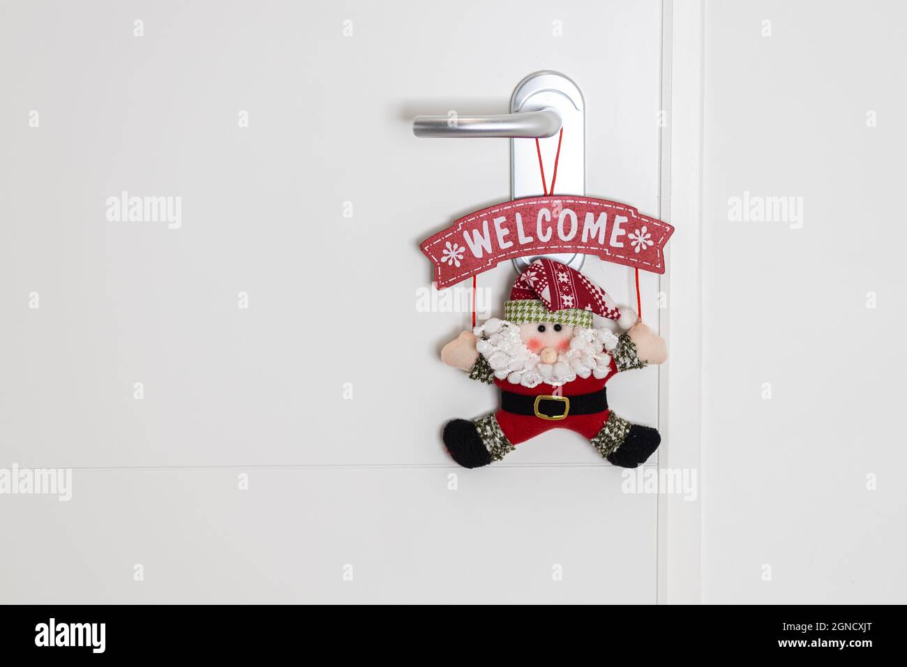 Decoration santa claus welcoming in an entrance to a house Stock Photo ...