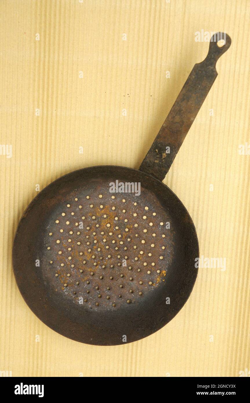 Perforated iron skillet hi-res stock photography and images - Alamy